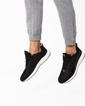 Puma online store at AJIO.com - Buy Puma Shoes, Track pants & More